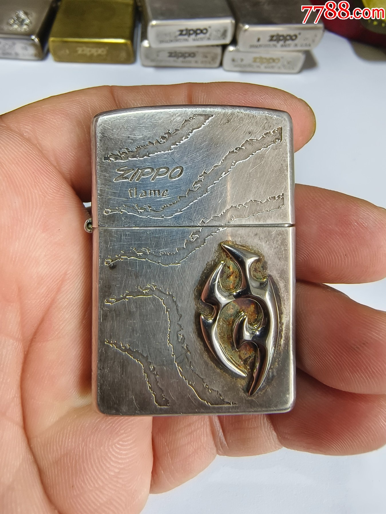 06款浮雕Zippo打火机-价格:300元-se93970925-打火机/点火器-零售-7788收藏__收藏热线